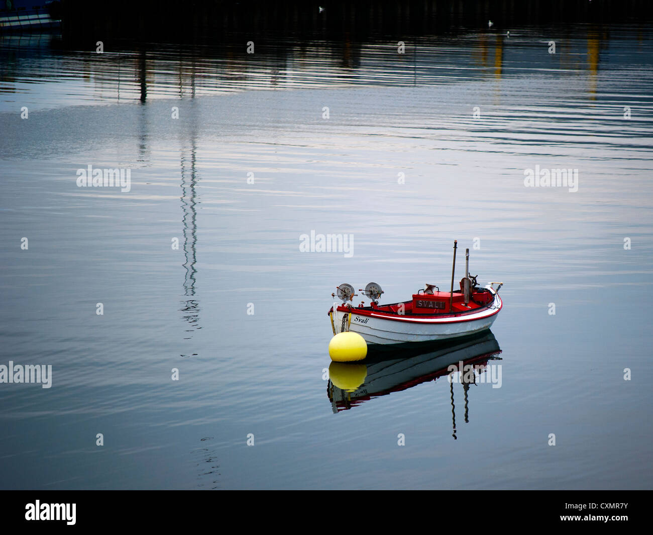 Single boat on Djupivogur's harbor, Iceland Stock Photo - Alamy