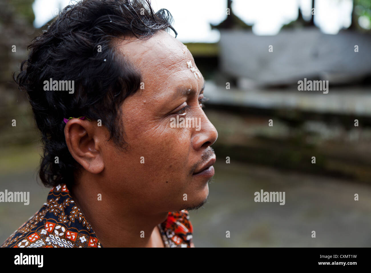 Balinese Man with Rice Corns on his Front on Bali Stock Photo - Alamy