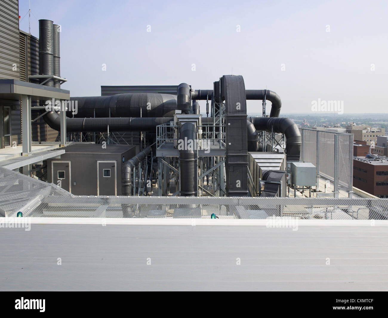 Ducts, Vents & Pipes On Building Roof Top Stock Photo - Alamy