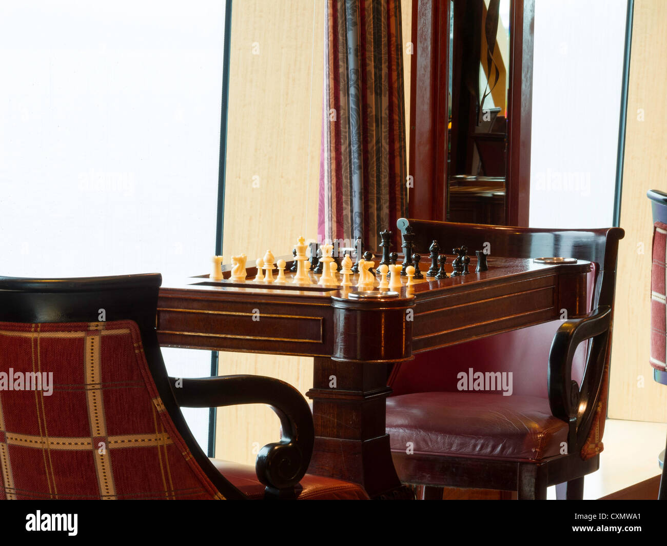 Chess Pieces and Chessboard on Wood Table Stock Photo - Alamy