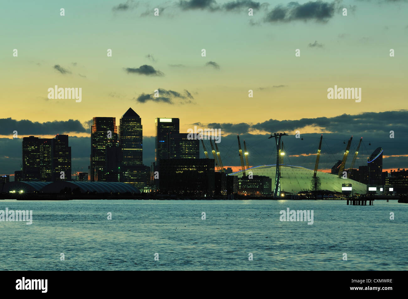 London Docklands skyline at dusk with Canary Wharf and o2 Arena Stock ...