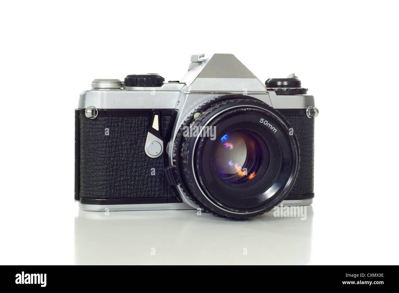 Vintage 35mm camera on white background with lens and reflection on the ...