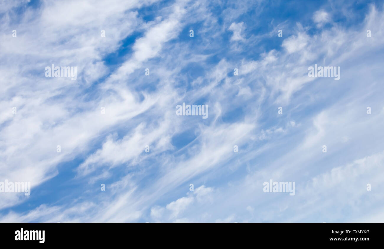 Beautiful windy clouds on the blue sky background Stock Photo - Alamy