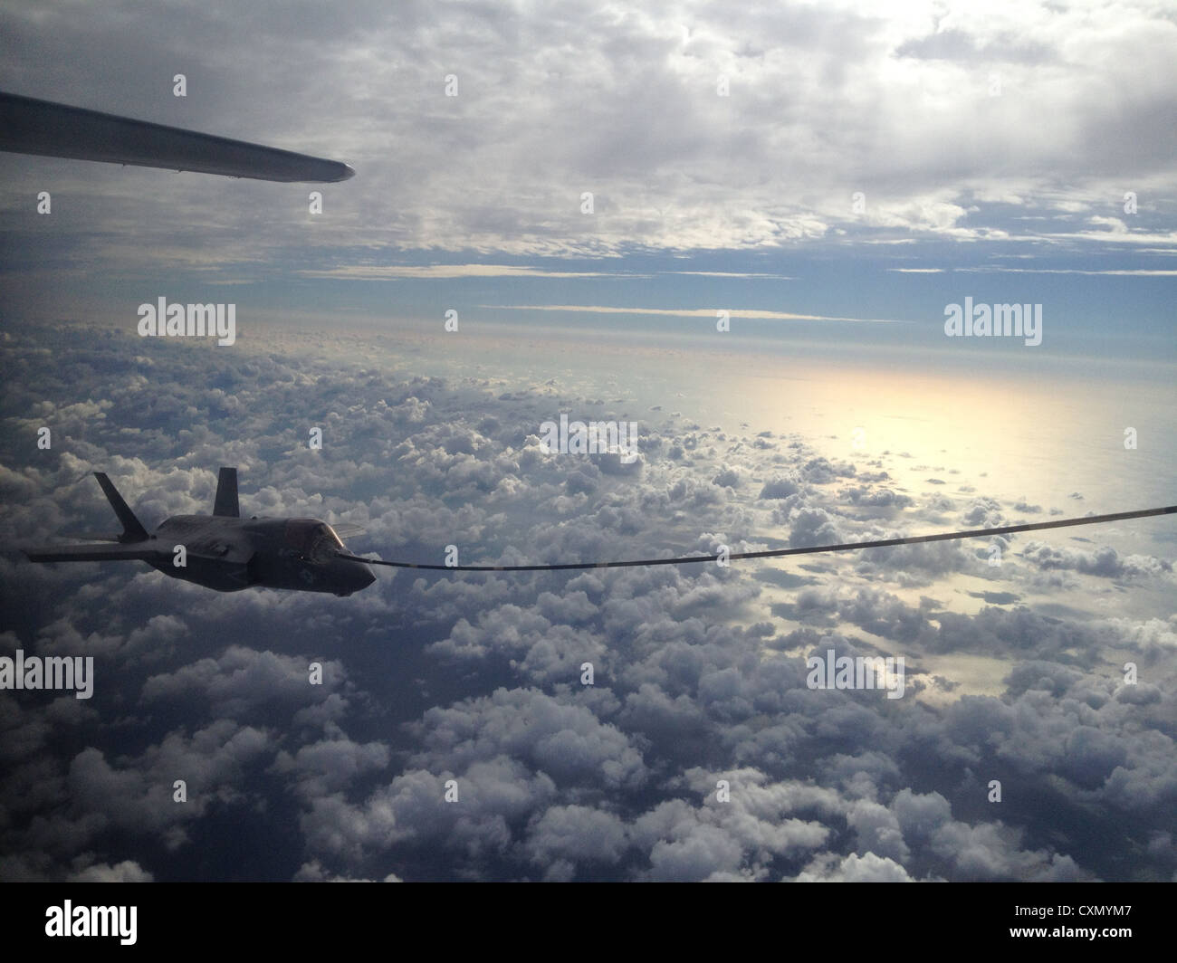 An F-35B Joint Strike Fighter conducts the first aerial refueling of ...