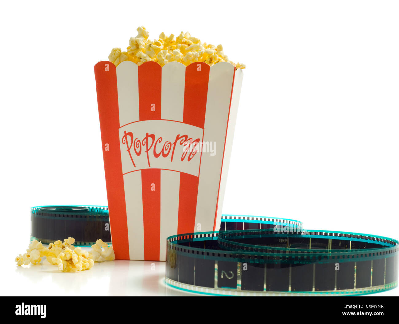 A box of popcorn with a strip of 35mm film on a white background ...