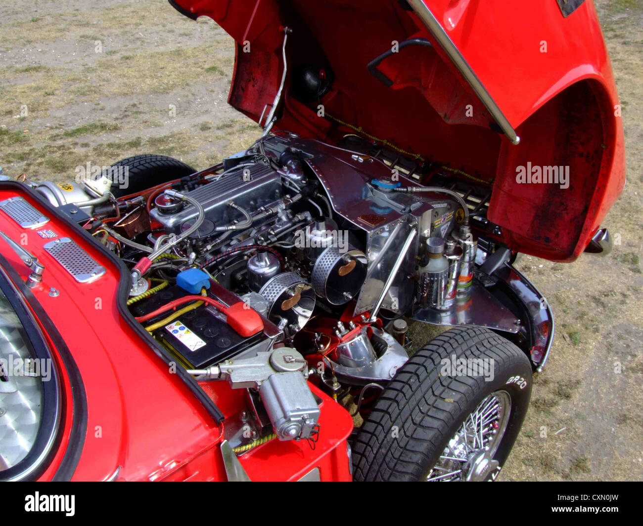 Red Triumph classic car Stock Photo - Alamy