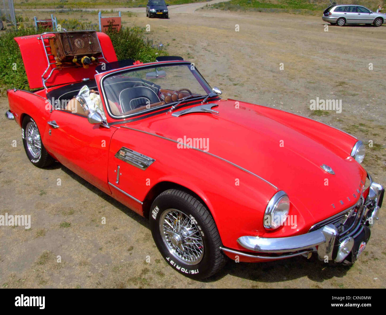 Red Triumph classic car Stock Photo - Alamy