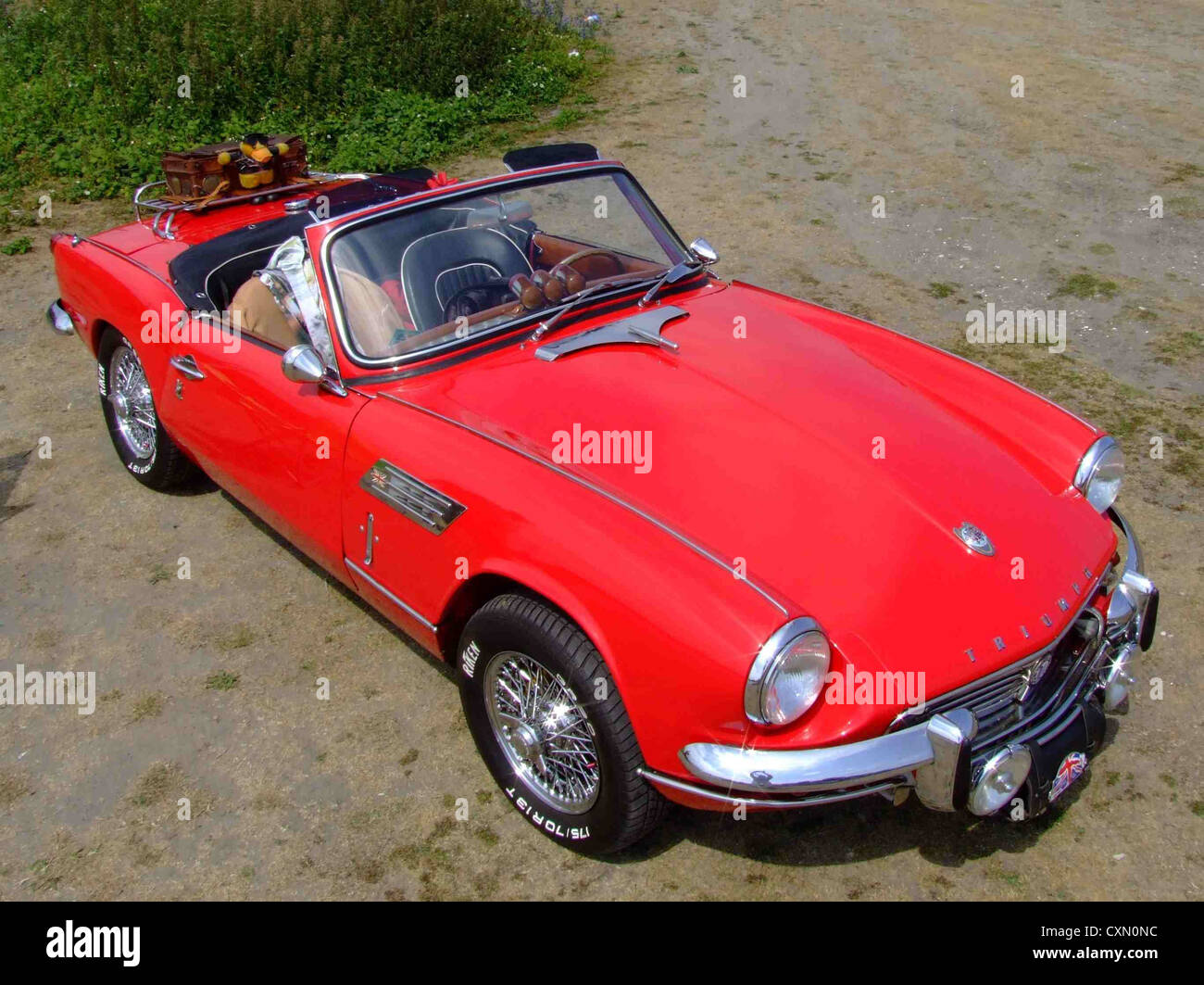 Red Triumph classic car Stock Photo - Alamy