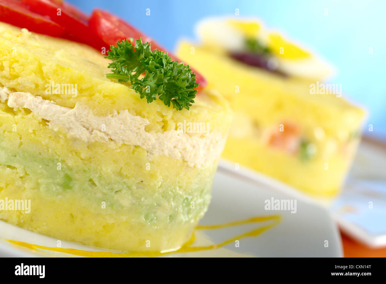 Peruvian dish called Causa, which is made of mashed yellow potatoes ...