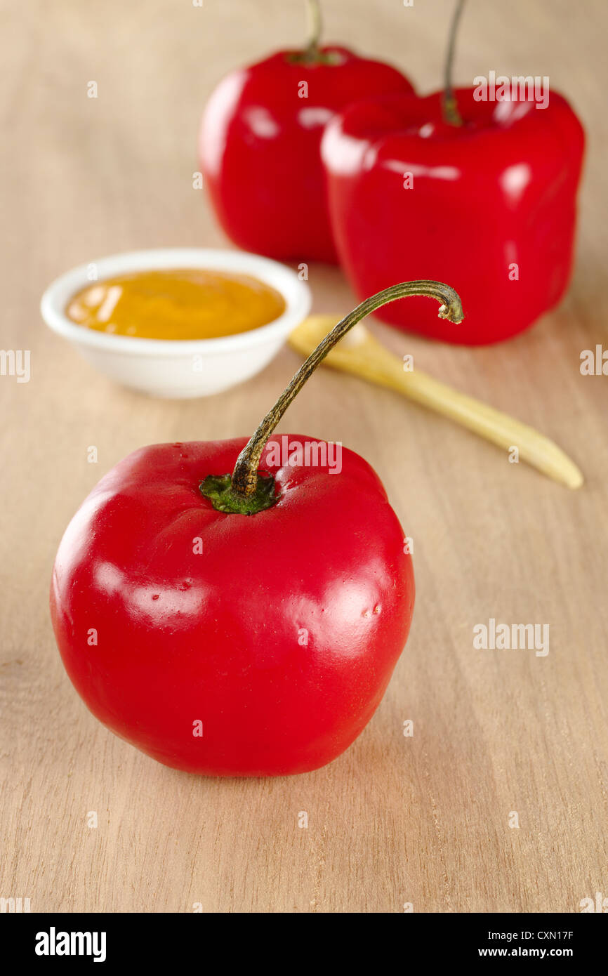 Peruvian hot pepper called rocoto with salsa made out of it in the ...