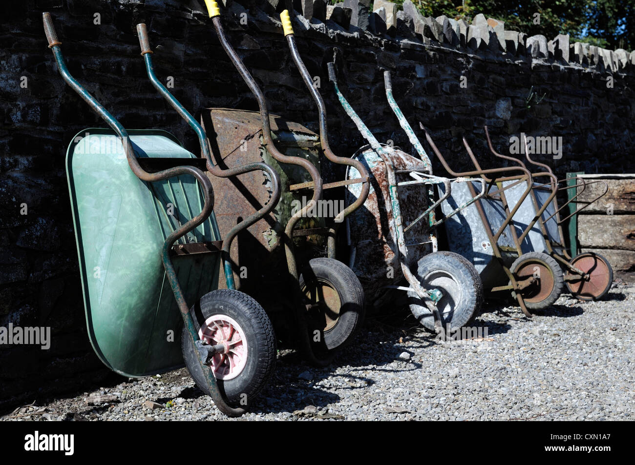 Upright wheelbarrows hi-res stock photography and images - Alamy