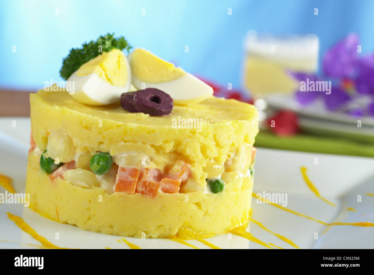 Traditional Peruvian dish called Causa made of mashed yellow and white ...