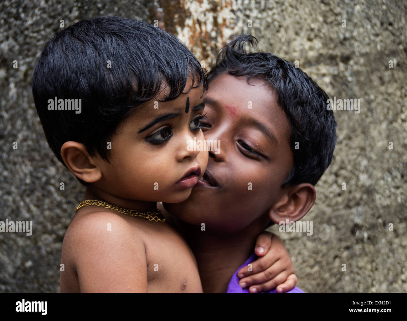 Two Keralan brothers being affectionate Stock Photo - Alamy