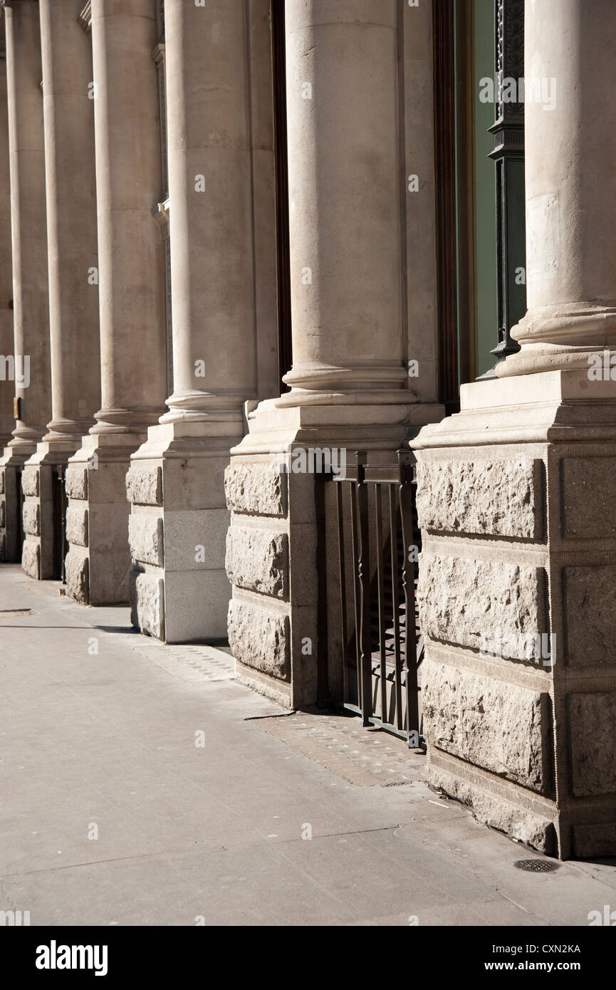 Empty street showing pillars and gate Stock Photo - Alamy