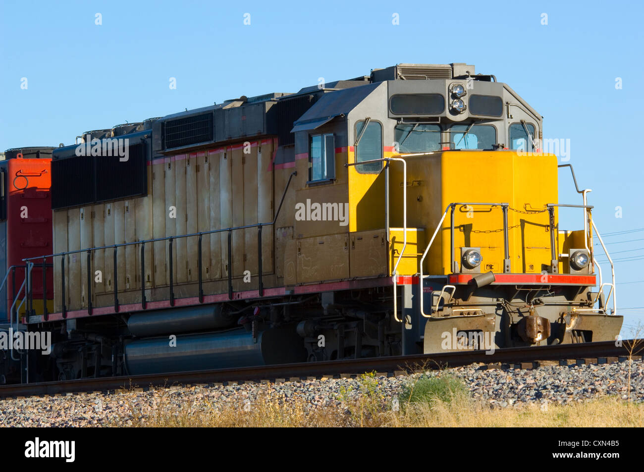 Train engine in yard on sunny day Stock Photo - Alamy