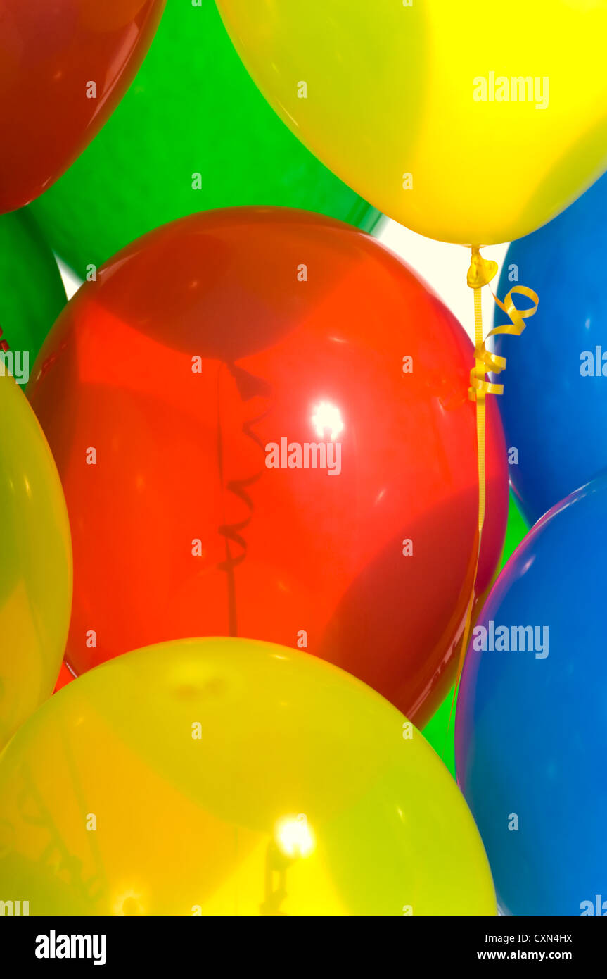 Brightly colored party balloons Stock Photo - Alamy