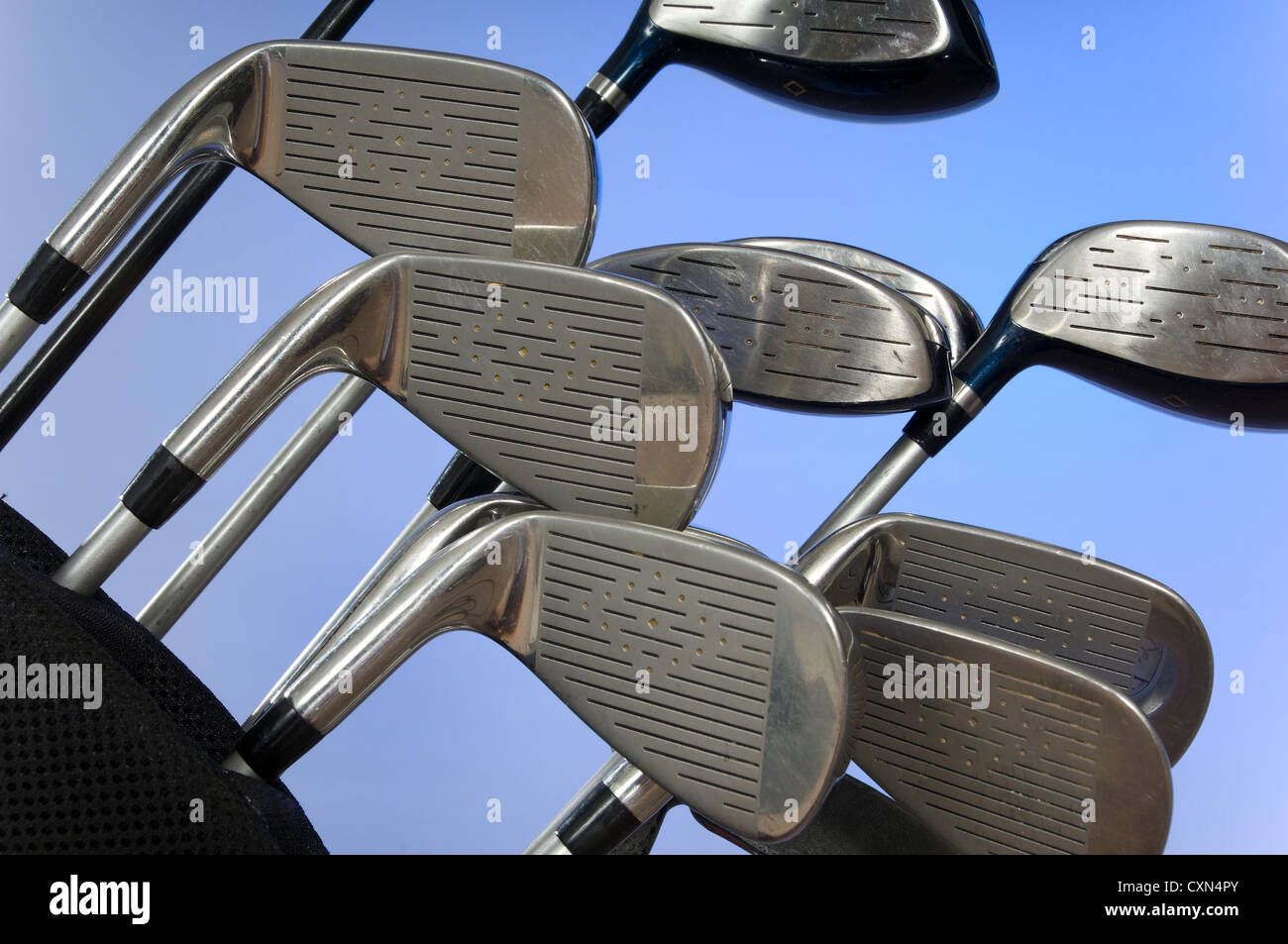 Golf club on blue background - great for background Stock Photo - Alamy