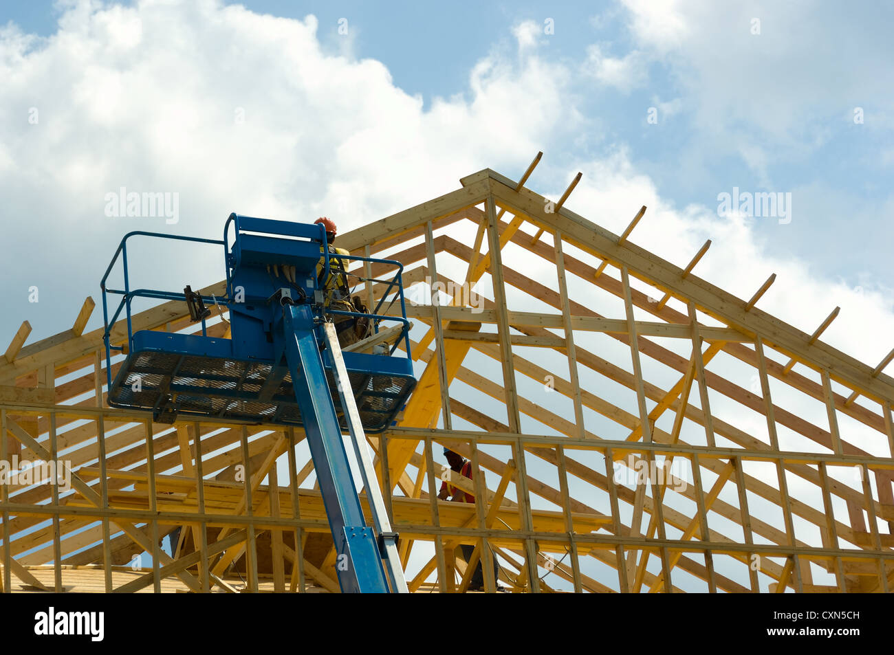 Men working on a building in the construction industry Stock Photo - Alamy
