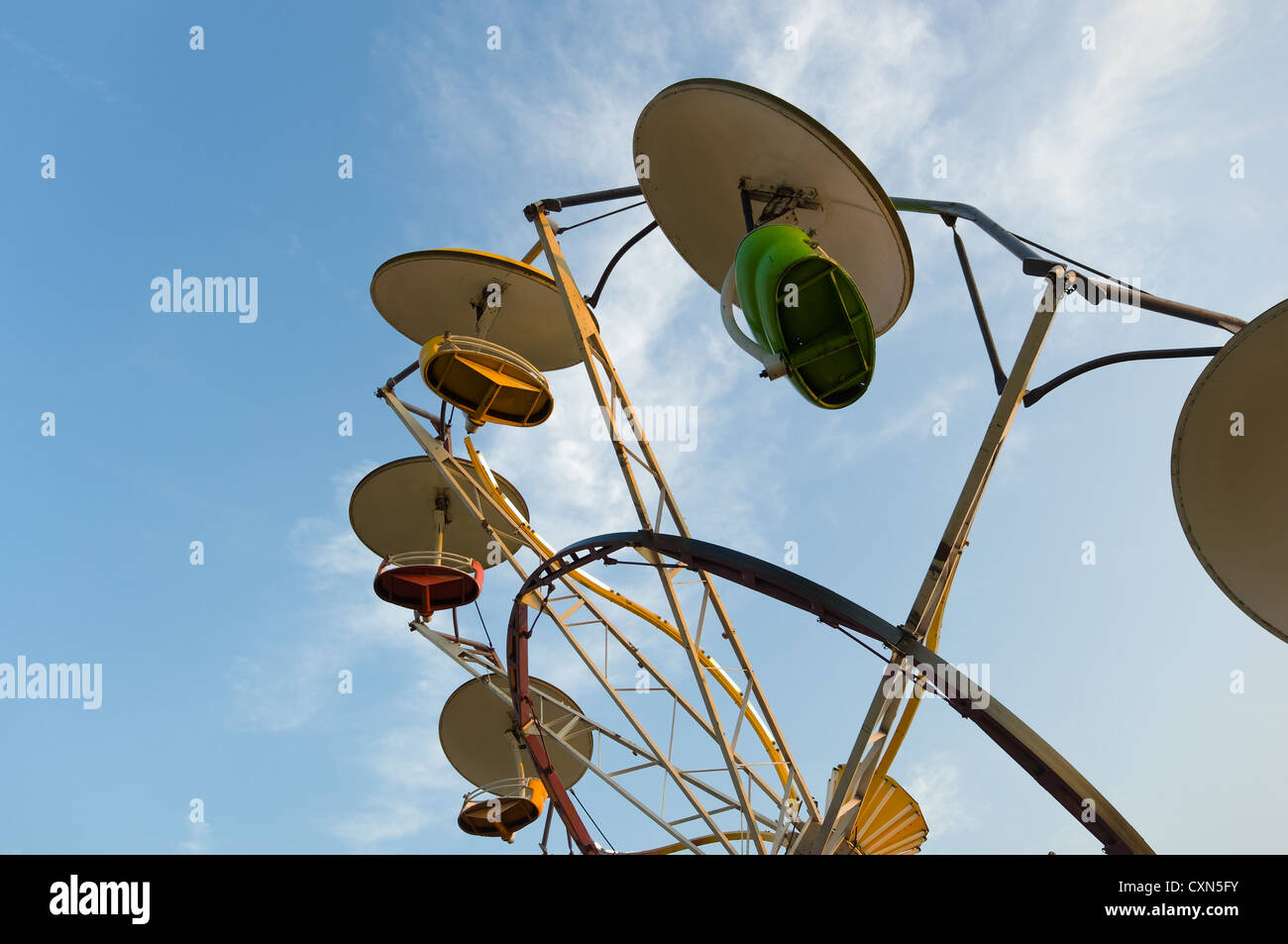 Carnival ride on blue sky sunny day Stock Photo - Alamy