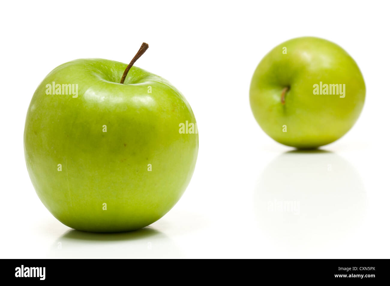 Two apples on white background Stock Photo - Alamy