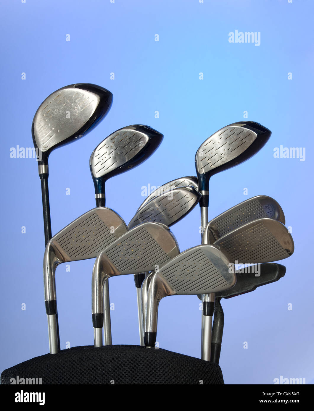 Golf club on blue background - great for background Stock Photo - Alamy
