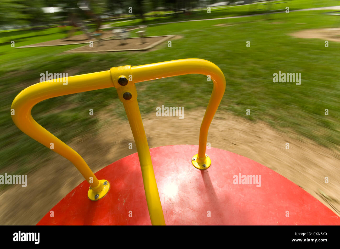 Children's Playground equipment - merry go round spinning very fast ...