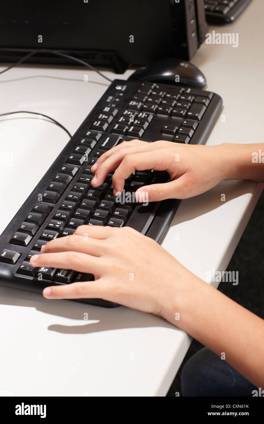 child's hands using computer keyboard Stock Photo - Alamy