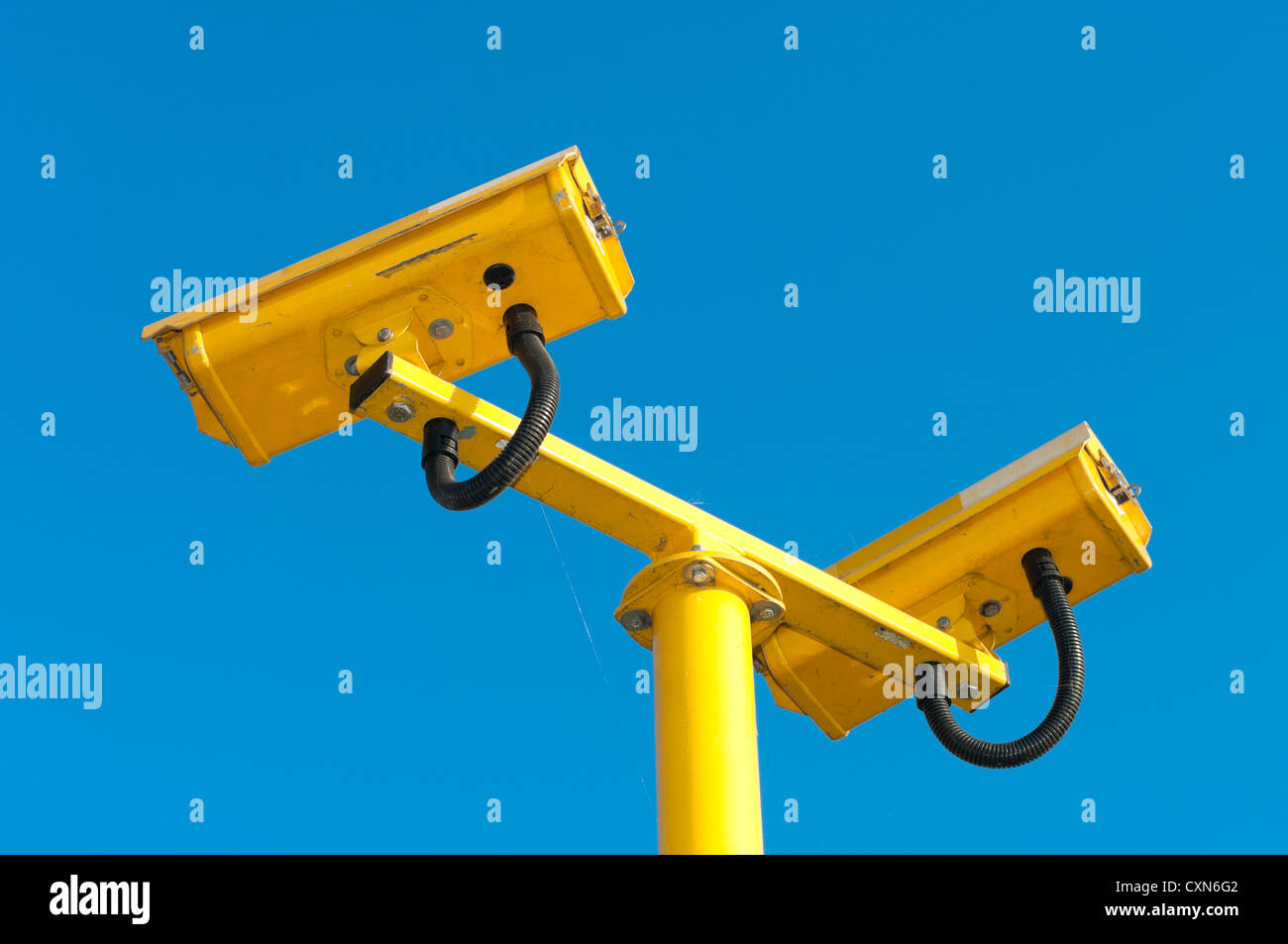 double surveillance security camera or CCTV against blue sky Stock ...