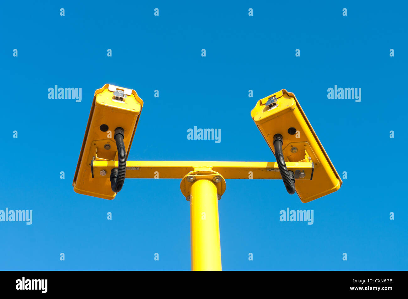 double surveillance security camera or CCTV against blue sky Stock ...