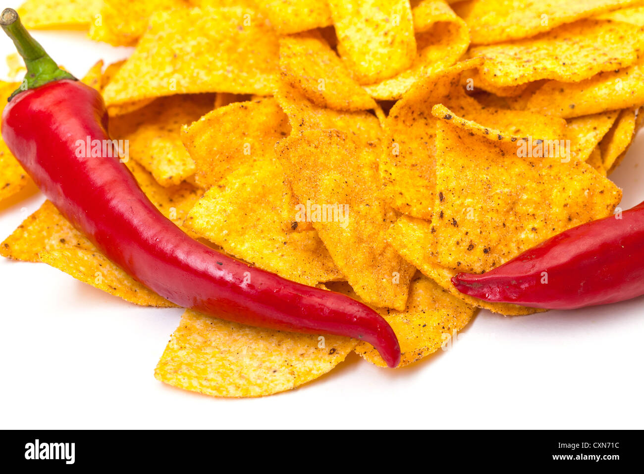 Spicy Corn Chips with Chilli Pepper on white background Stock Photo - Alamy