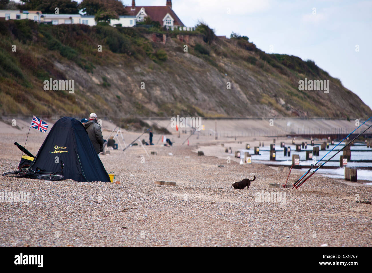 Fishing from the Corton beach Stock Photo - Alamy