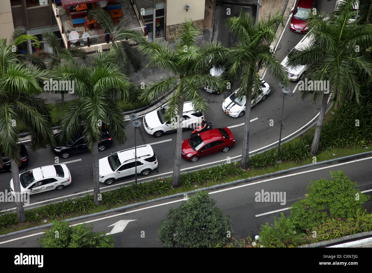 It's a photo view from above of a traffic jam in the street of Manila ...