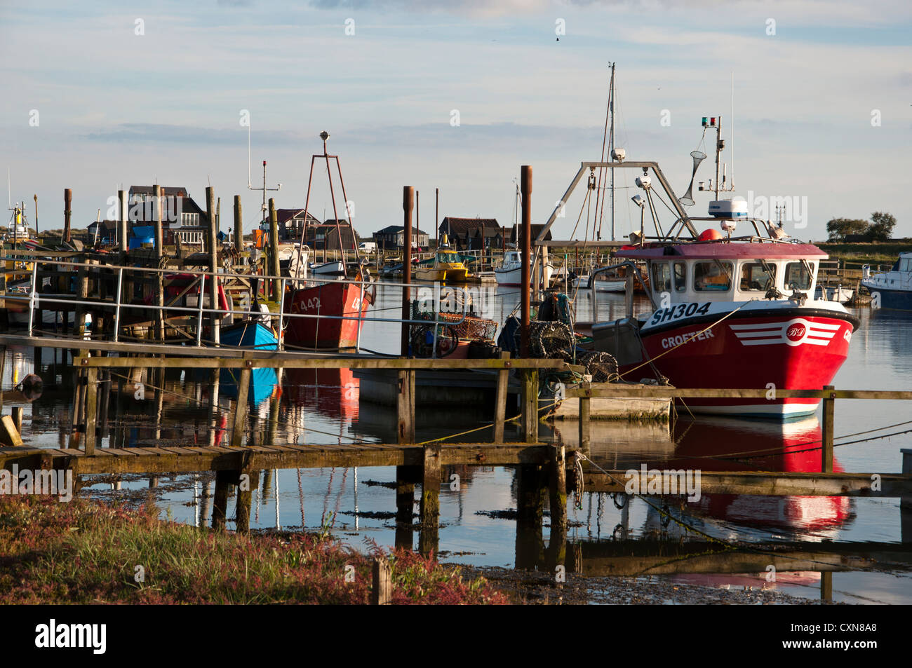 Southwold harbour with fishing boats Stock Photo - Alamy