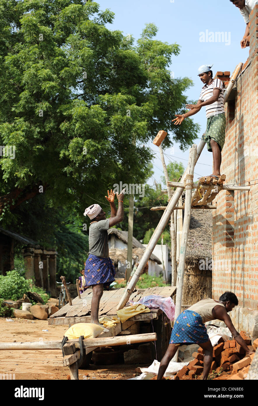 Indian men constructing a house Andhra Pradesh south India Stock Photo ...