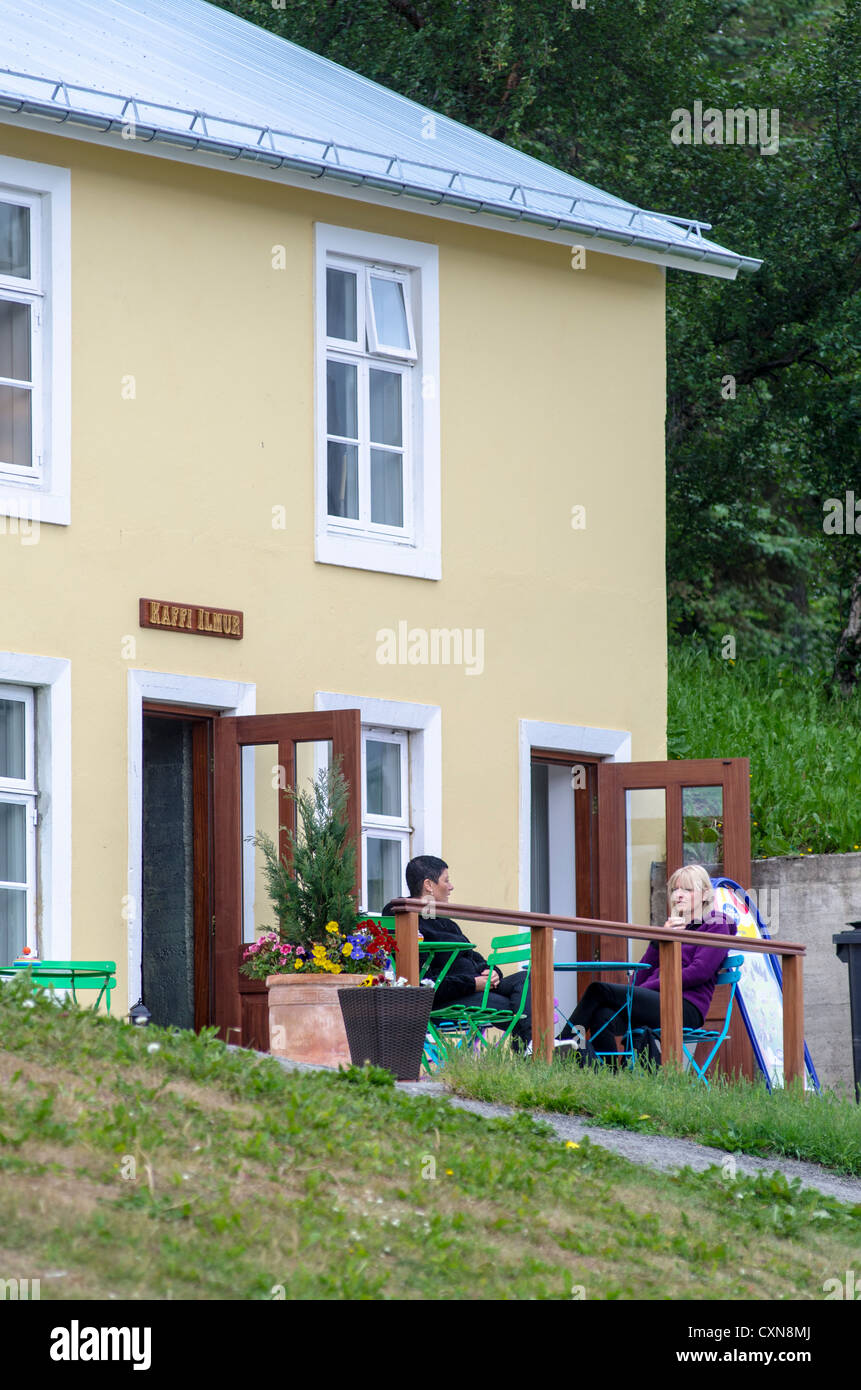 Couple seating at terrace of bar in Akureyri city, Iceland Stock Photo ...