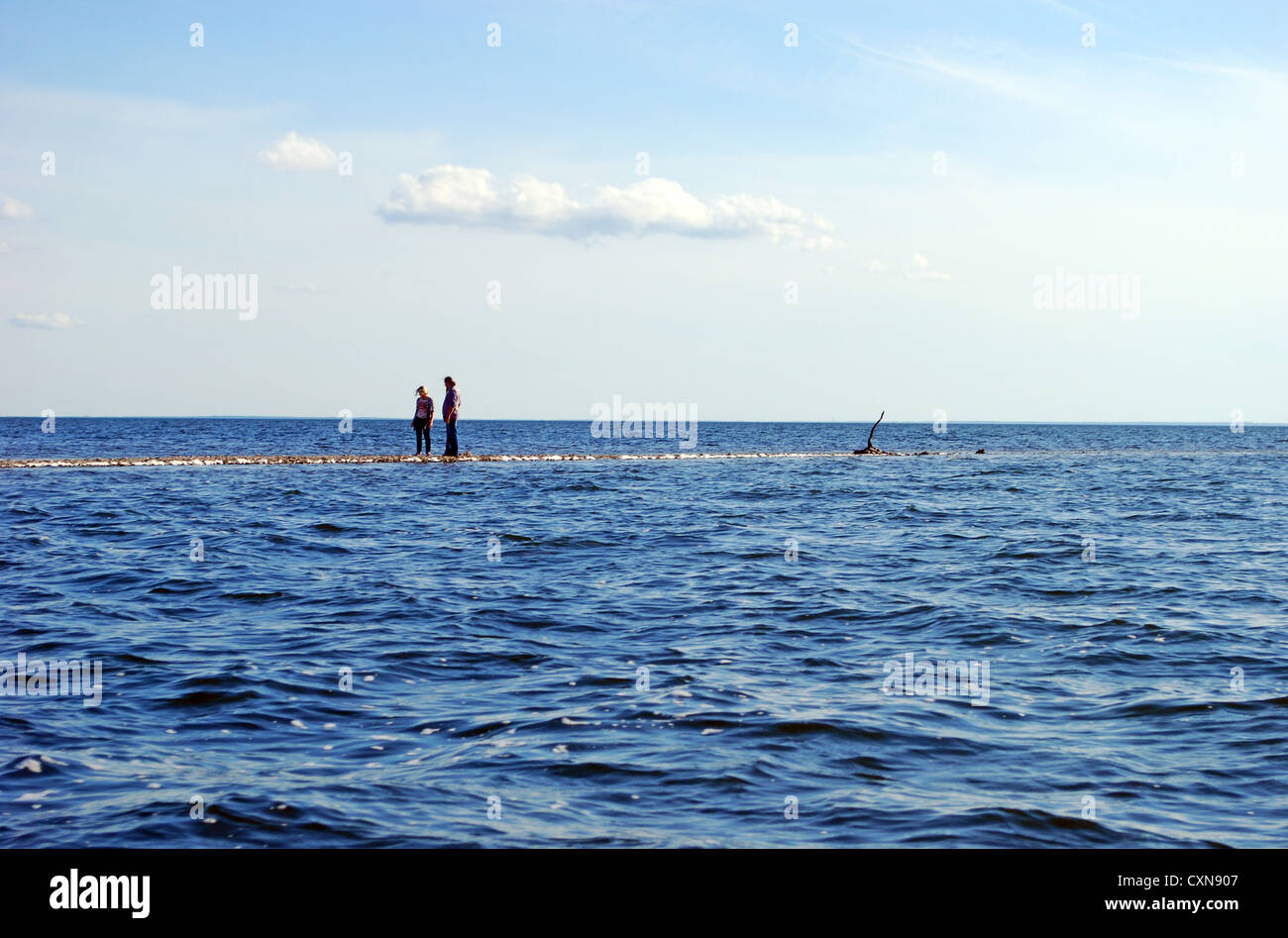 people and rocks stack landmark sea Hiiumaa Estonia Kassari Stock Photo ...