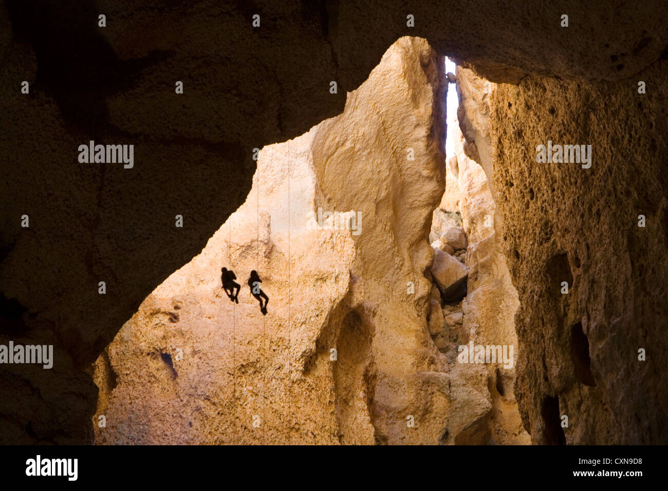 Spelunkers abseil into the Majlis Al Jinn, one of the world's largest ...