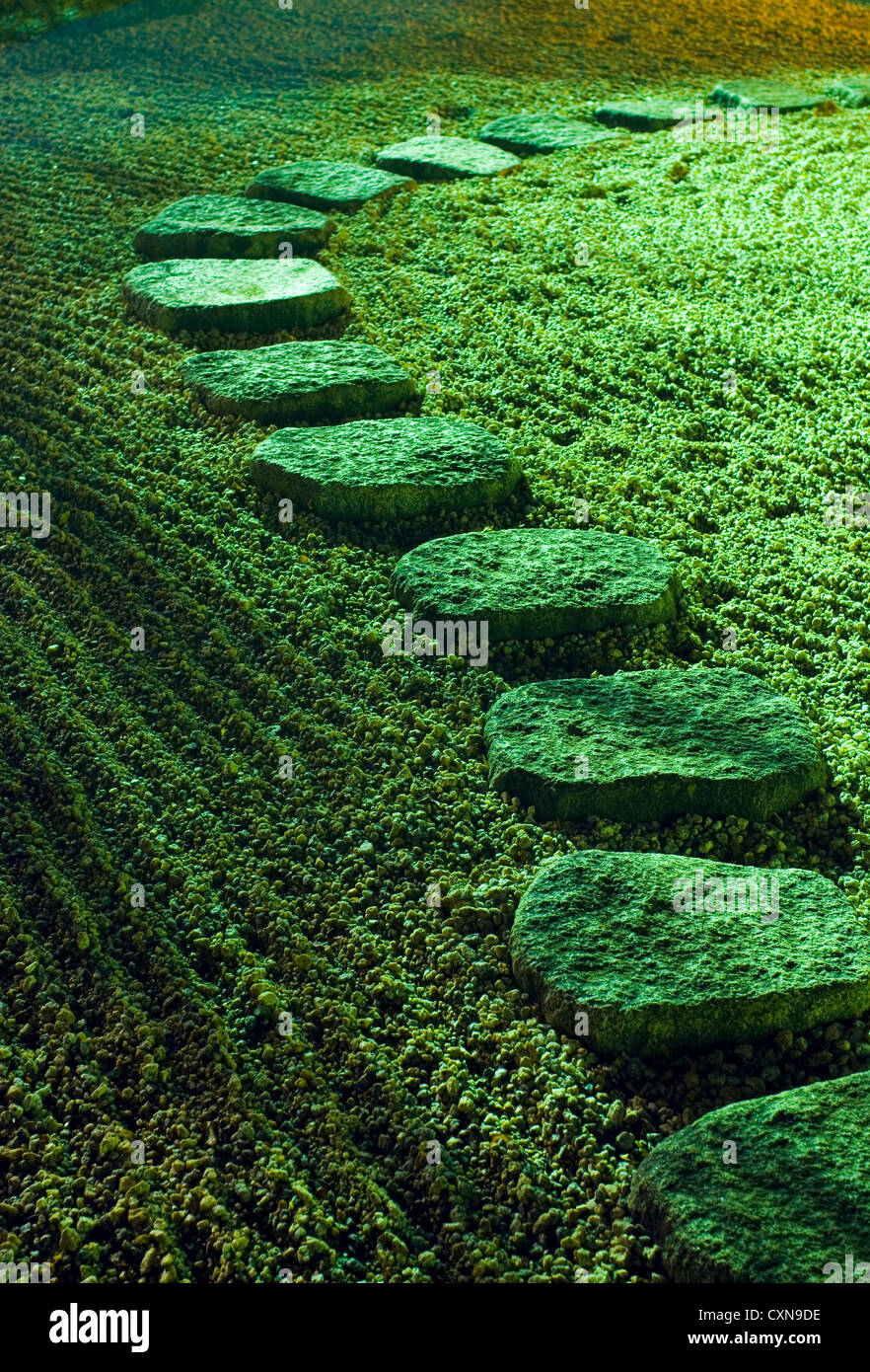 night image of stone pathway in Japanese zen garden, Tokyo Japan; focus ...