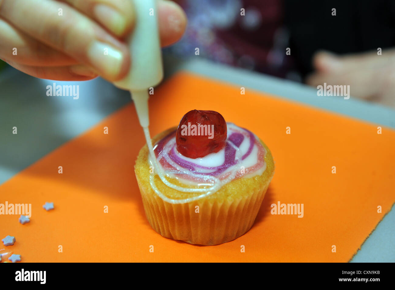 Comic Relief cherry bun Stock Photo - Alamy