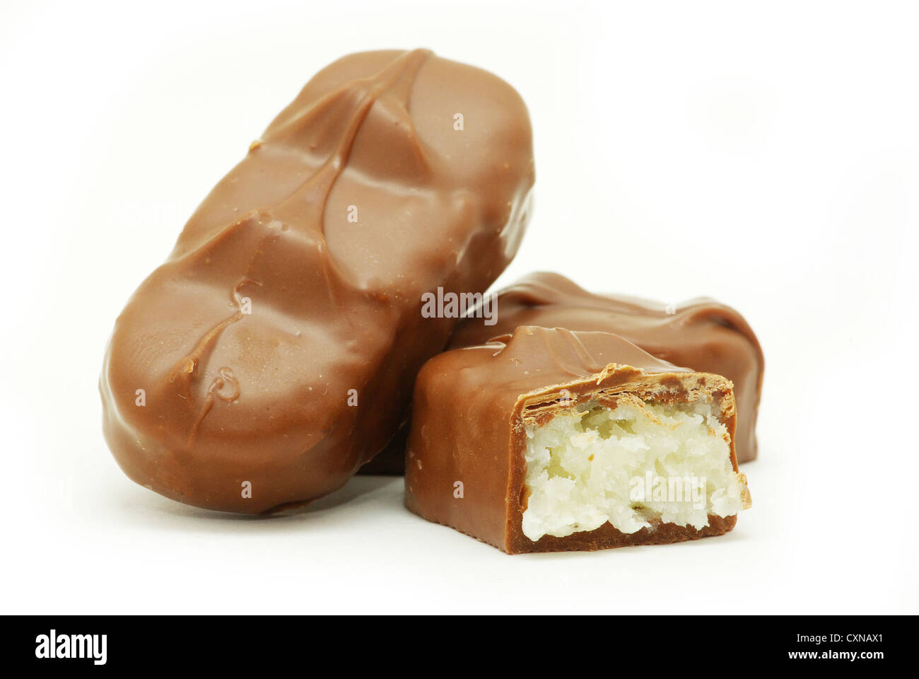 Delicious chocolate confetti isolated on white Stock Photo - Alamy