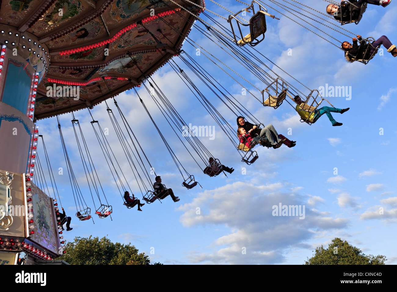 A Carousel spins fairgoers sideways at Nottingham's historic Goose Fair ...