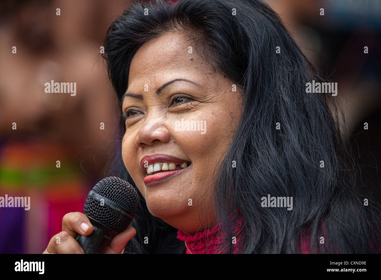 Woman singing in public asia hi-res stock photography and images - Alamy