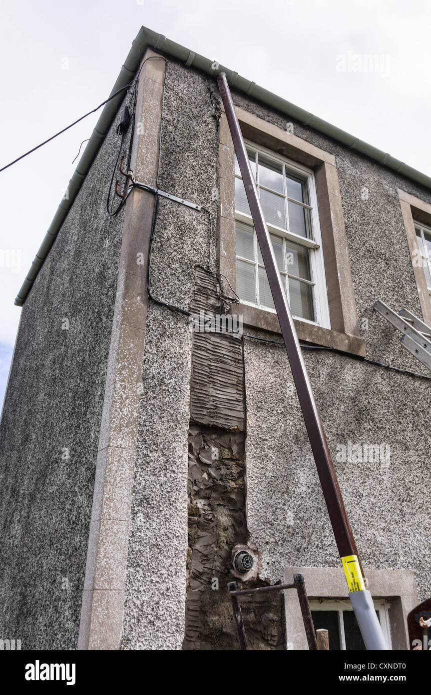 Repairs to 200 year old house with crack near end of wall. Stage 2 ...