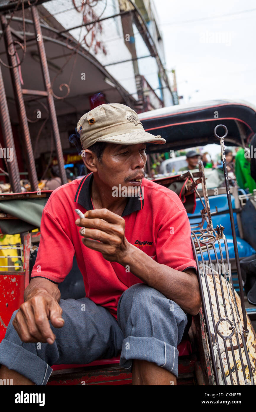 Rickshaw Driver in Yogyakarta in Indonesia Stock Photo - Alamy