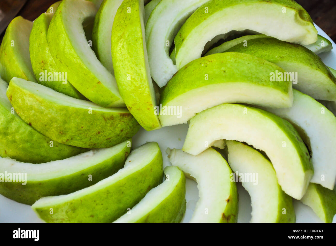 The guava had been cut in pieces before serving Stock Photo - Alamy