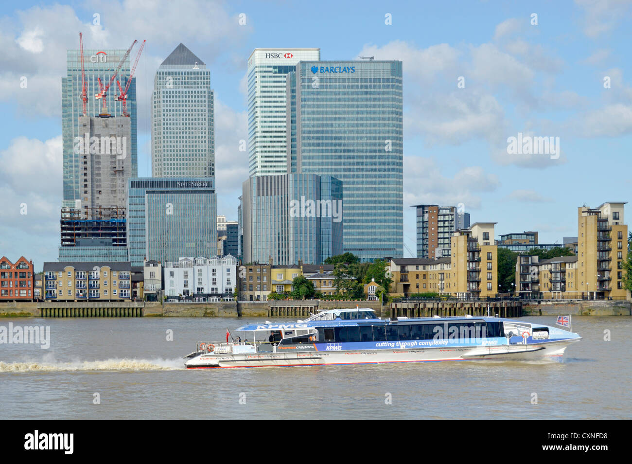 New KMPG sponsorship advertising on Thames Clipper riverboat passing ...