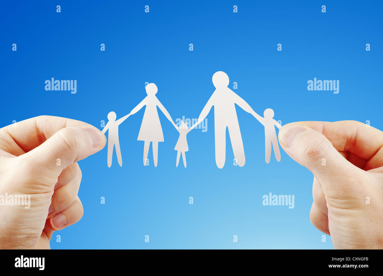 paper family in hands Stock Photo - Alamy