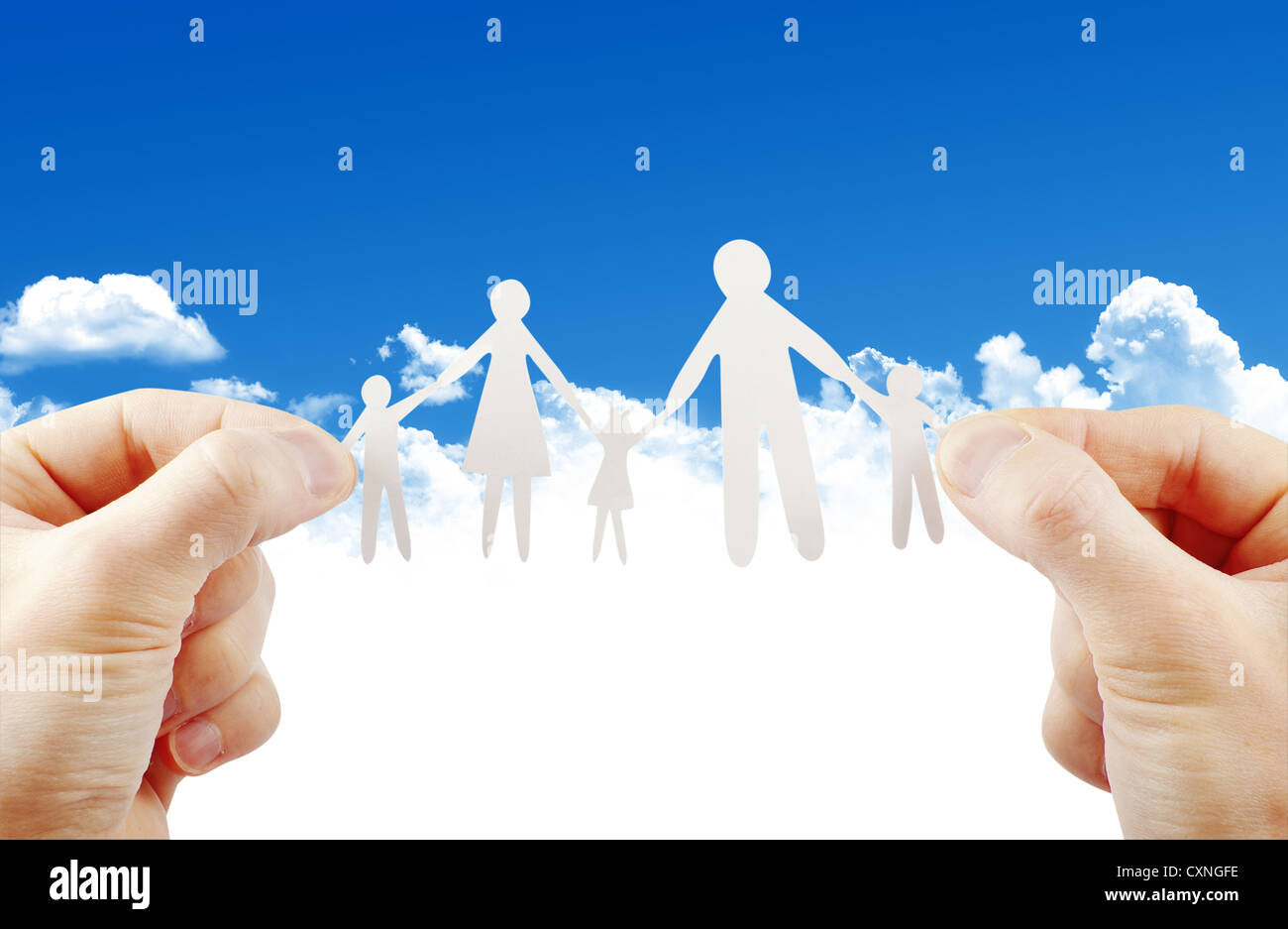 paper family in hands Stock Photo - Alamy