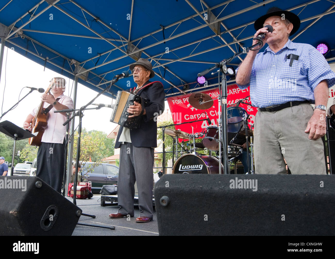 Tejano style music group including young white male, senior Mexican ...