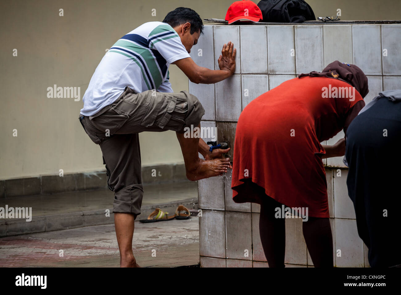 Ritual washing hi-res stock photography and images - Alamy